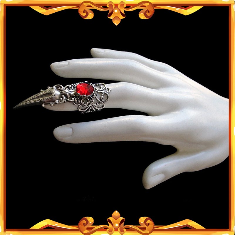 Be vampiric to the fingertips with this ruby gothic Claw Ring