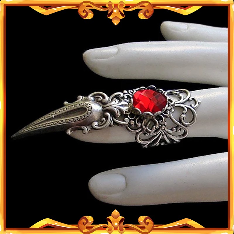 Be vampiric to the fingertips with this ruby gothic Claw Ring